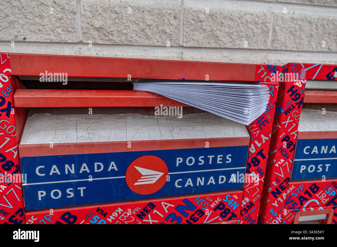 13 March 2025 - Calgary Alberta Canada - Envelopes dropped in Canada ...