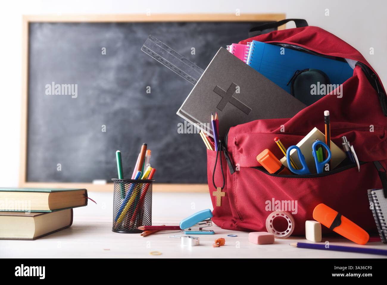 School education in a religious school with a red backpack full of ...