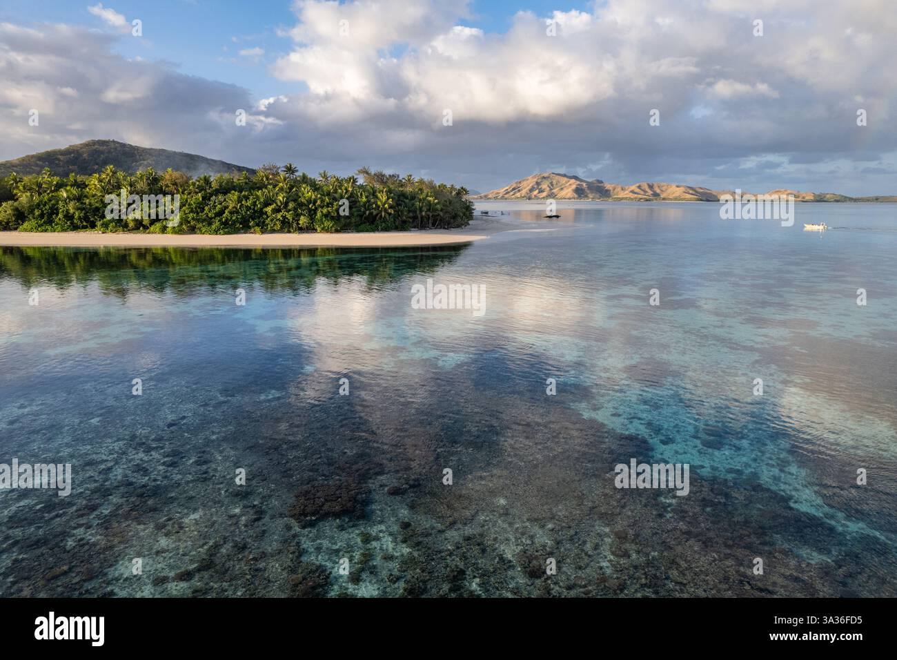 Aerial view of remote Tropical Islands surrounded by Coral Reefs in ...