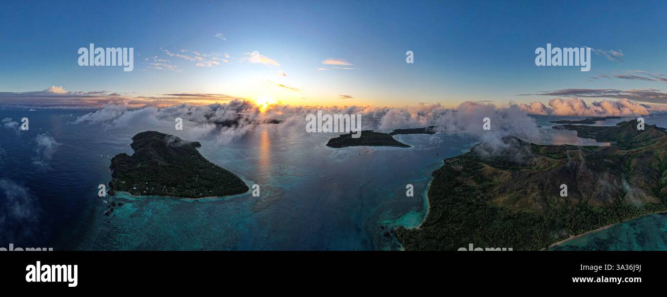 Aerial view of remote Tropical Islands surrounded by Coral Reefs in ...