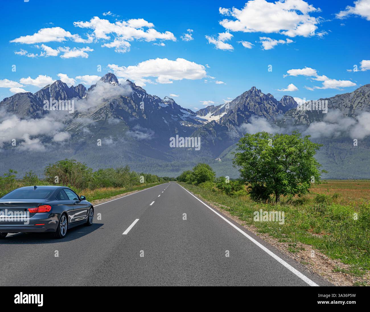 Car drives along straight road hi-res stock photography and images - Alamy
