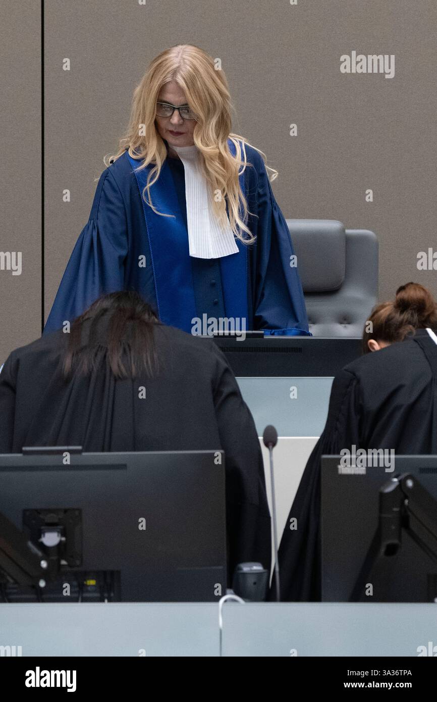 Presiding judge Iulia Antoanella Motoc enters the courtroom where ...