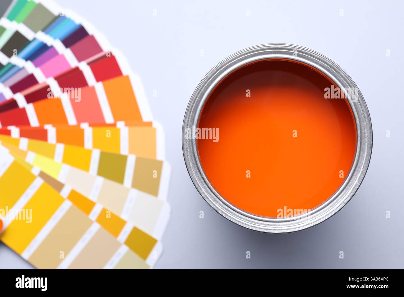 Can of bright paint and color palettes on light grey background, flat ...