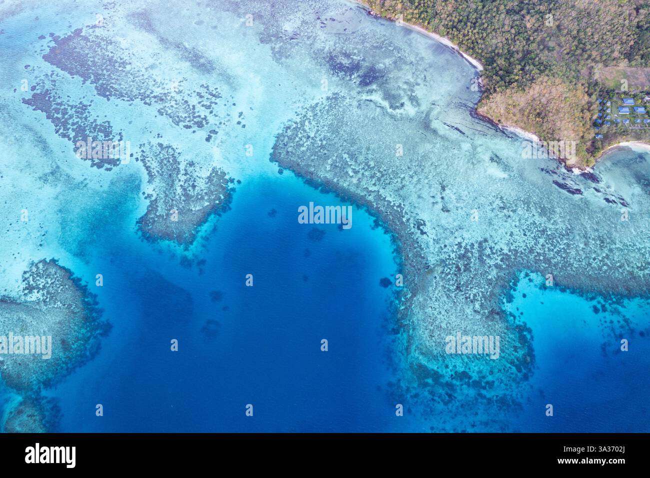 Aerial view of tropical coral reef in the Pacific Ocean in between ...