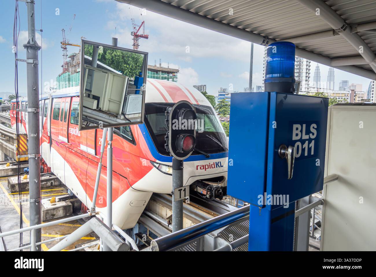 a Rapid KL Monorail train arriving at a station in Kuala Lumpur ...