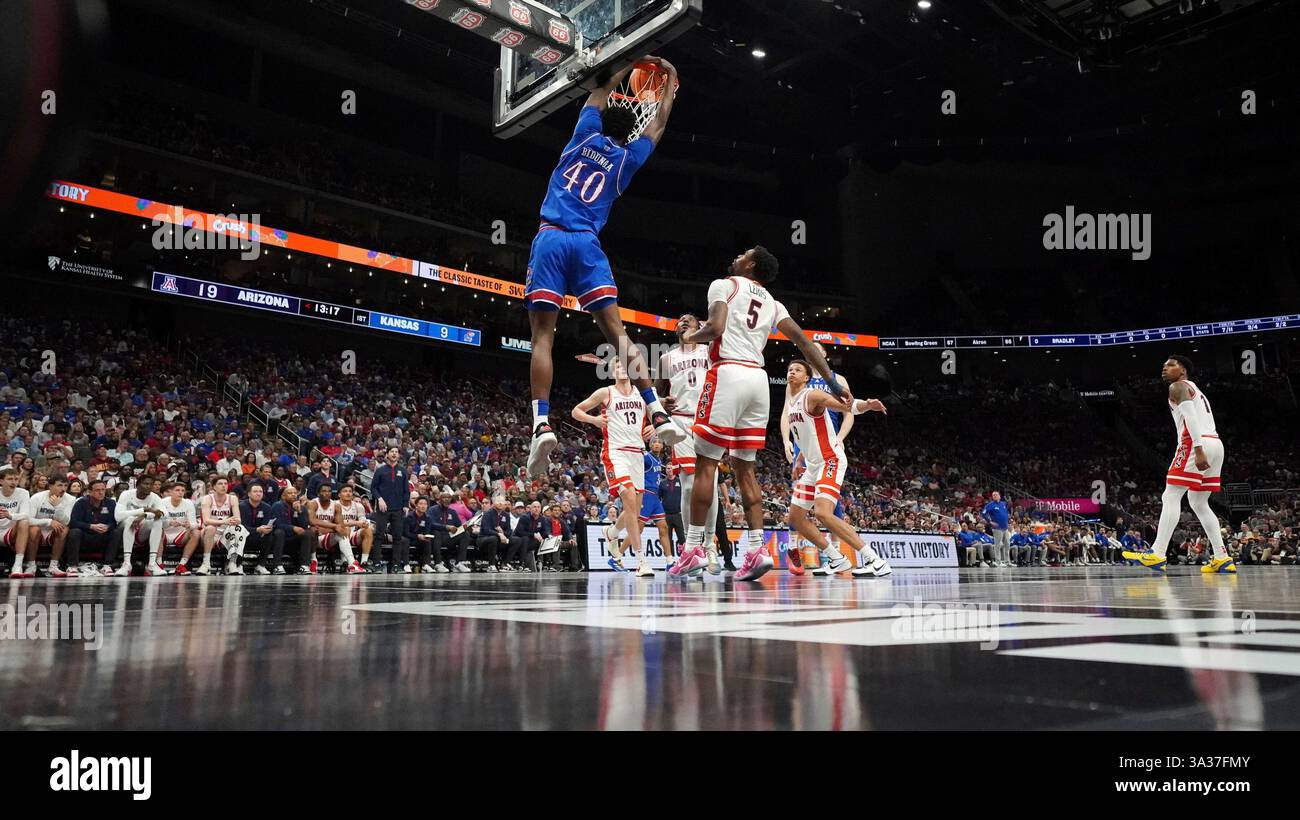 MAR 13 2025: Kansas Jayhawks forward Flory Bidunga (40) slams a rebound ...