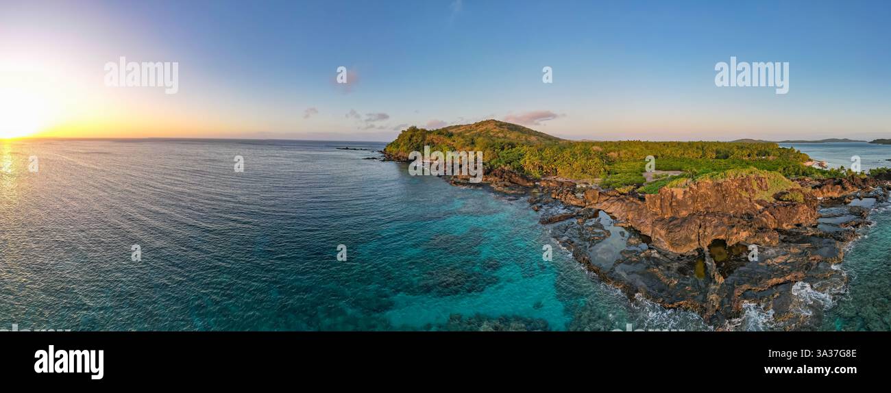 Aerial view of remote Tropical Islands surrounded by Coral Reefs in ...