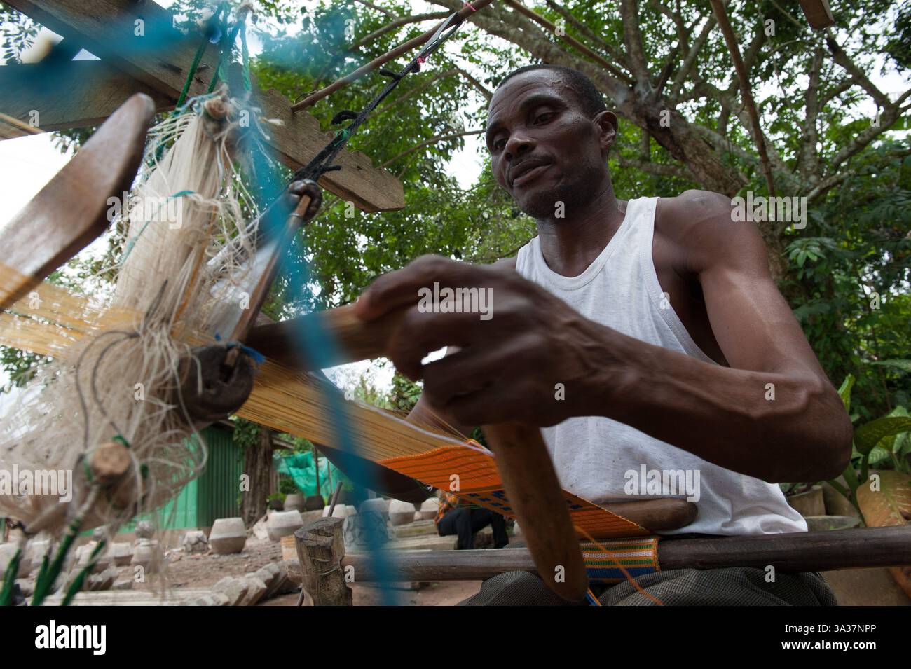 Aug. 4, 2013 - Man weaving clothing on a loom (Credit Image: © Lou ...