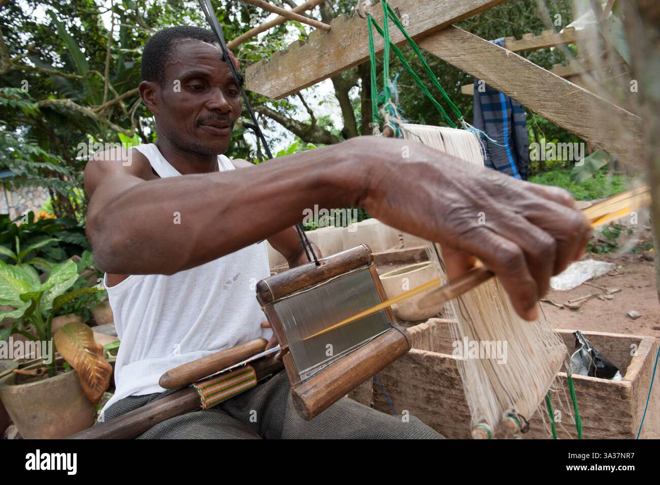 Aug. 4, 2013 - Man weaving clothing on a loom (Credit Image: © Lou ...