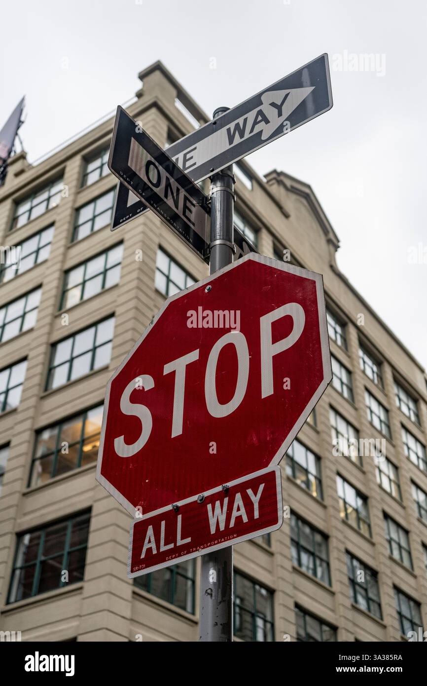 Capturing the Whole Street Signpost Featuring a STOP Sign Stock Photo ...