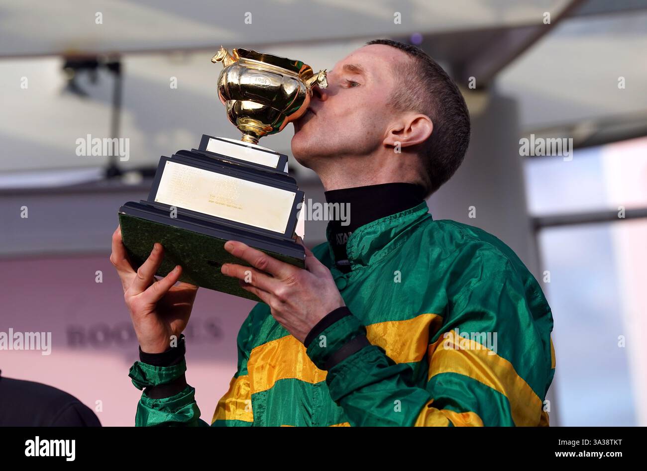 Jockey Mark Walsh with the trophy after winning the Boodles Cheltenham ...