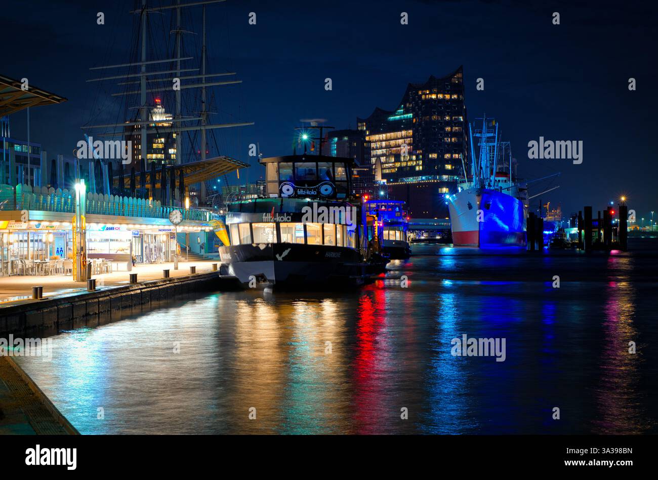 Colorful Lights from Ships at the Docks Reflecting on the Water at ...