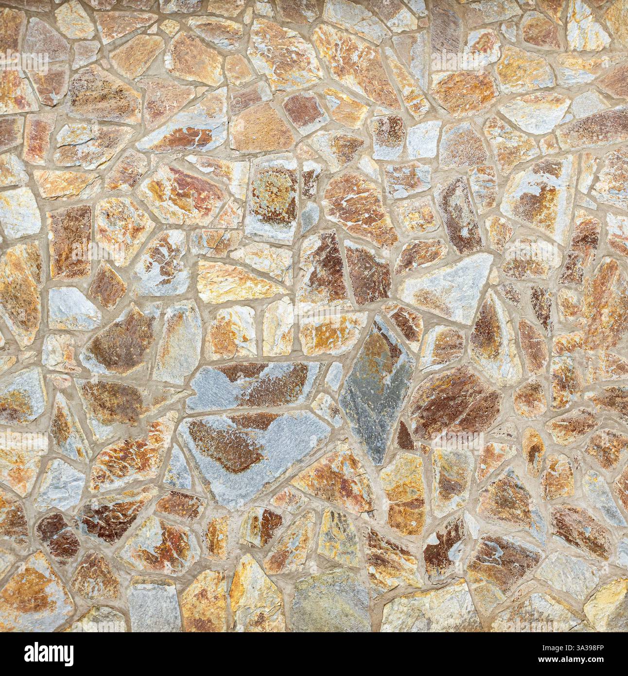 Colorful stone wall forming a rustic style background, ideal for ...