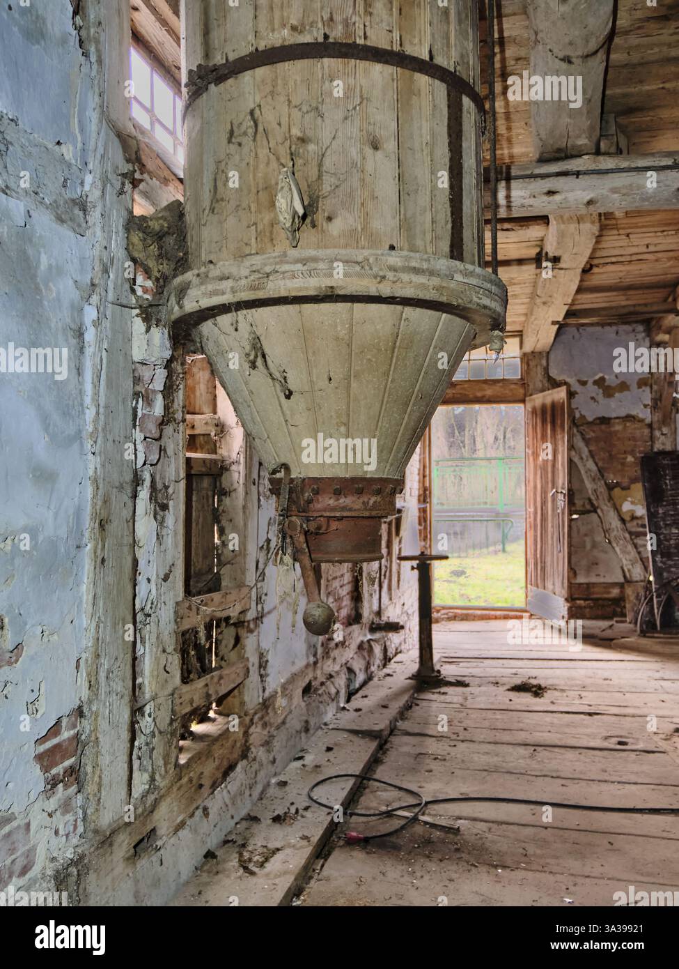 March 12, 2025 - Hoya-Germany: Aged flour mixer, wooden beams, brick ...