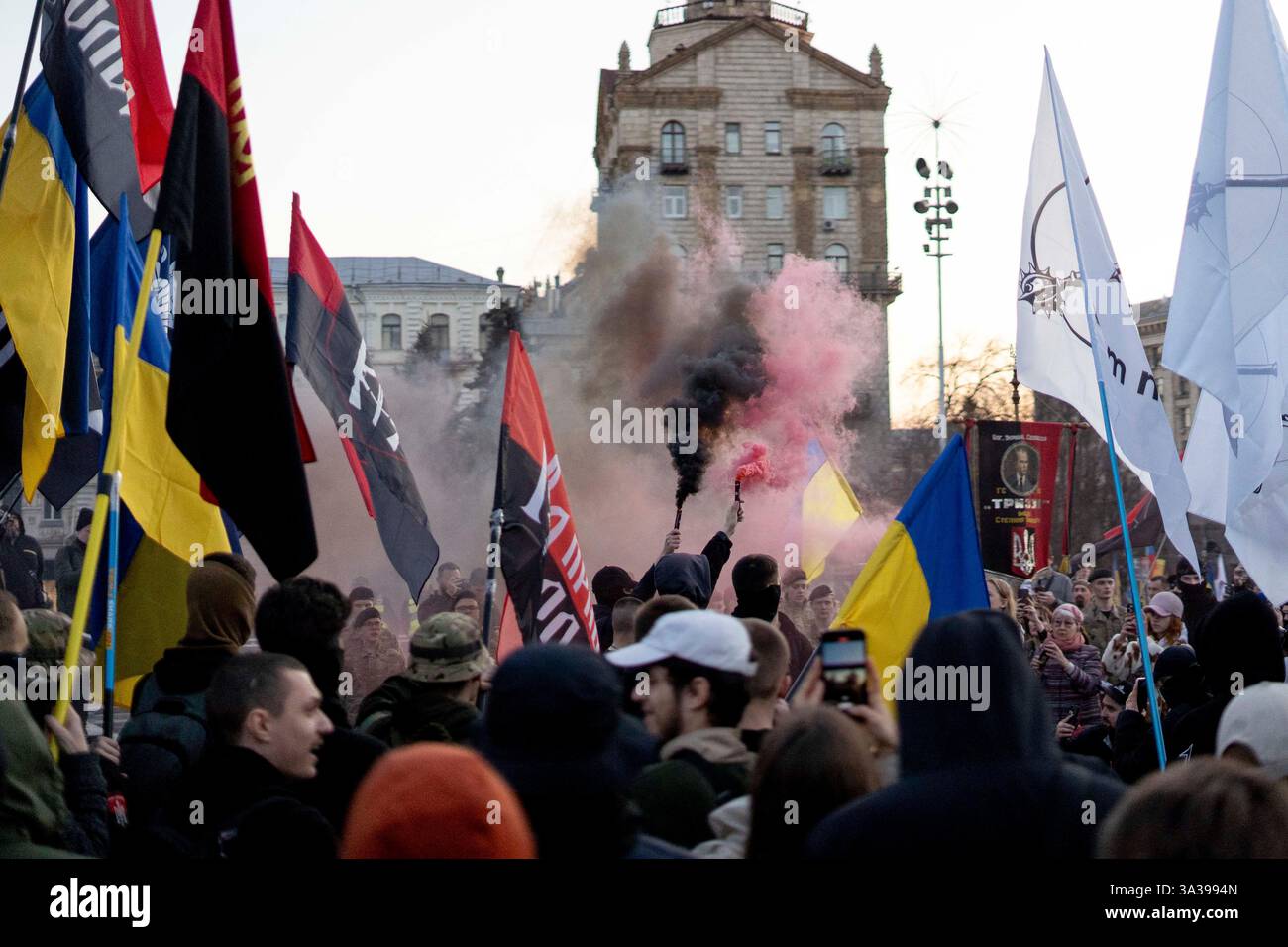 Smoke bombs being lit at march in honor of Ukrainian Volunteers in Kyiv ...