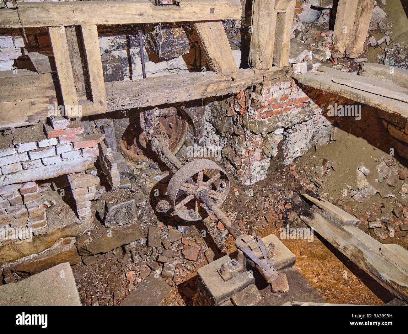 March 12, 2025 - Hoya-Germany: Rusty turbine and aged wooden beams and ...