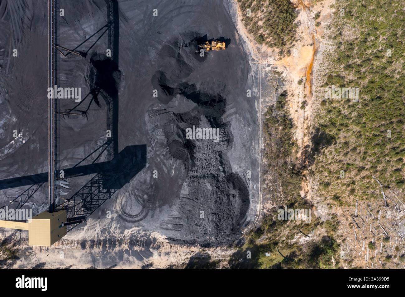 Drone aerial photograph of industrial machinery processing and moving ...