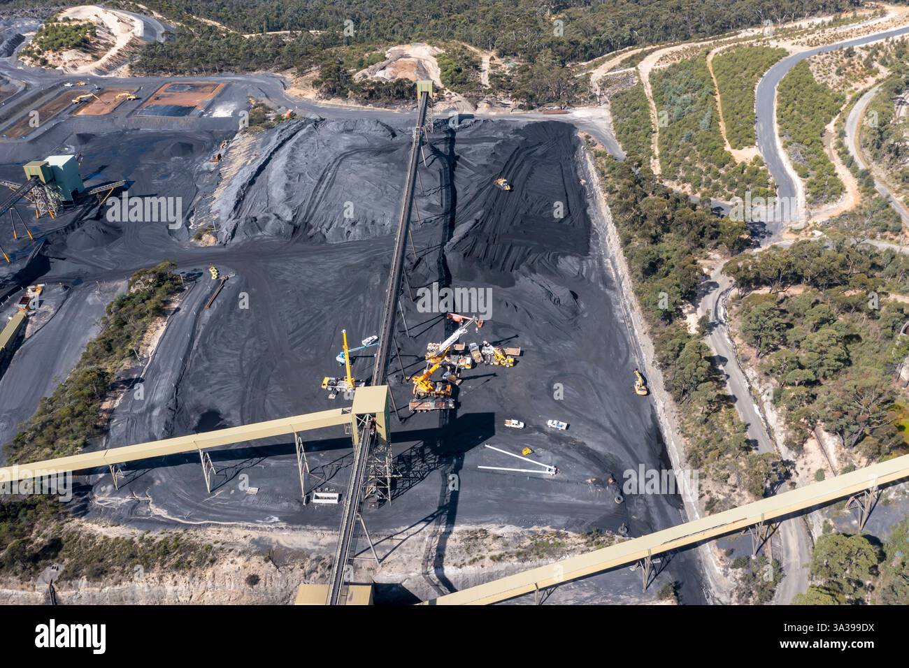 Drone aerial photograph of industrial machinery processing and moving ...