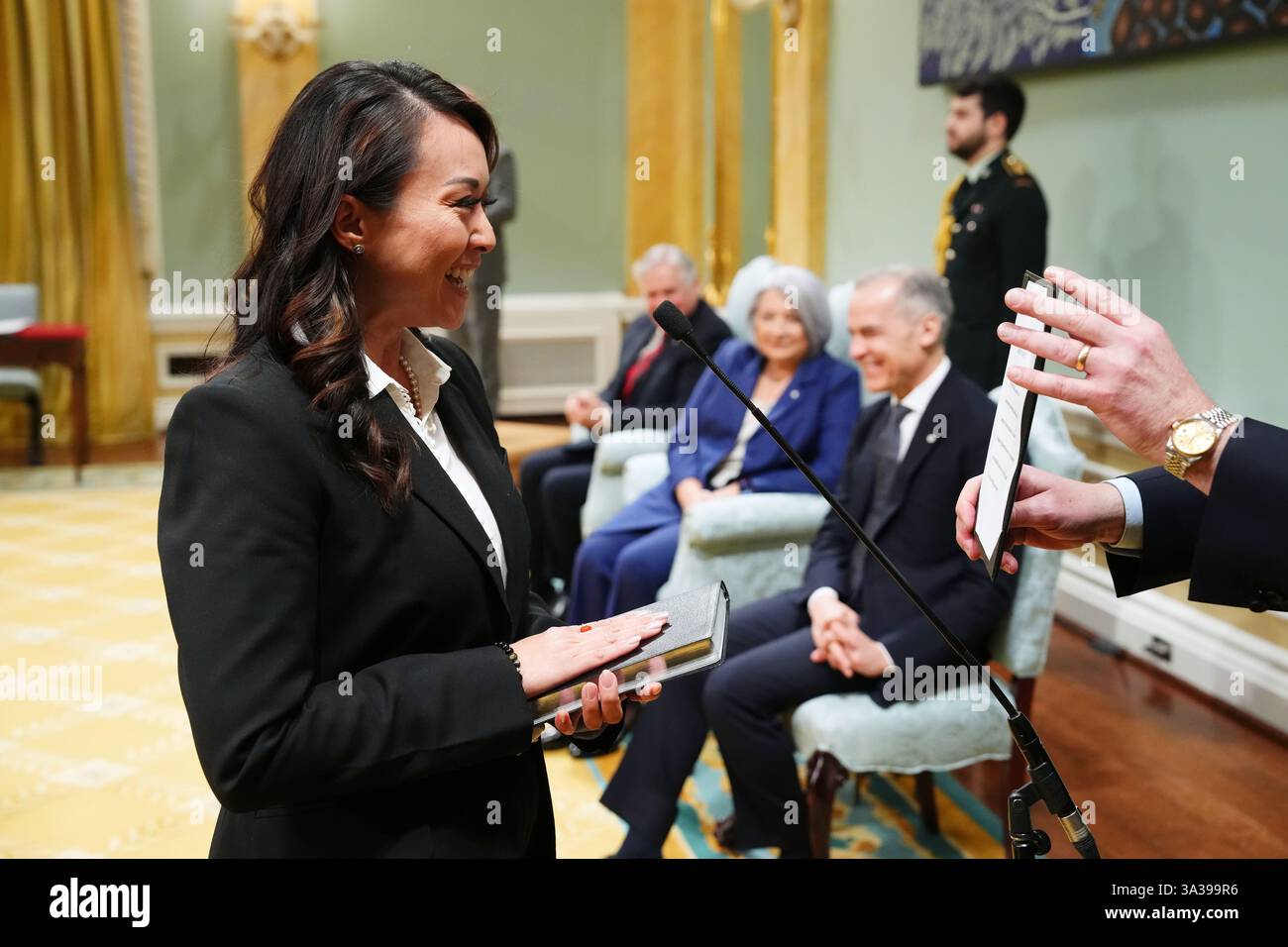 Ottawa, Canada. 14th Mar, 2025. Rechie Valdez is sworn in as the Chief ...