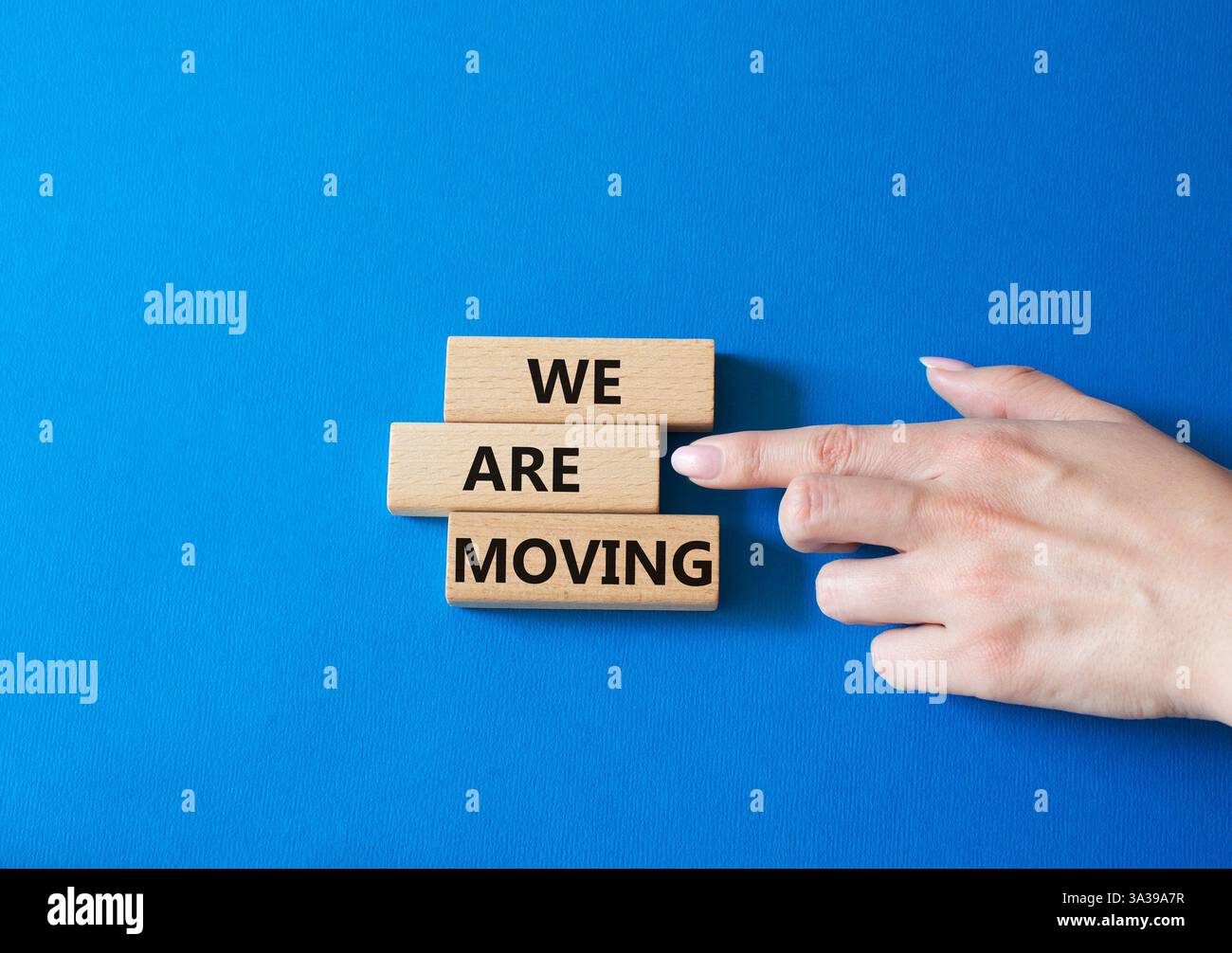 We are moving symbol. Concept word We are moving on wooden blocks ...