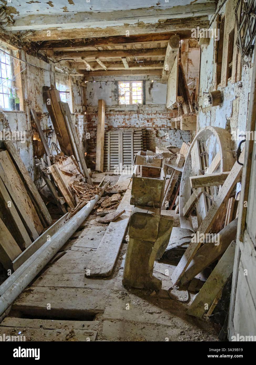 March 12, 2025 - Hoya-Germany: Aged mill interior with wooden wheel and ...
