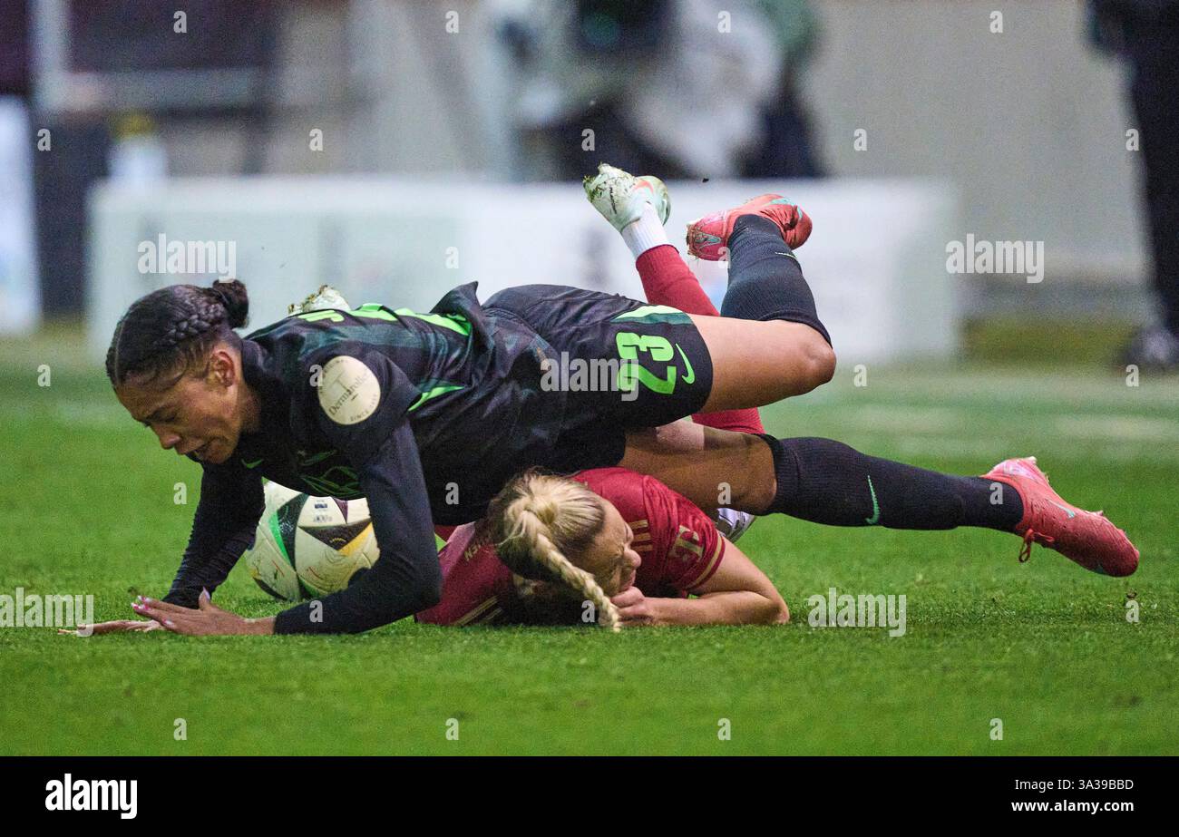 Munich, Germany. 14th Mar, 2025. Giulia GWINN, FCB Women Nr. 7 compete for the ball, tackling ...