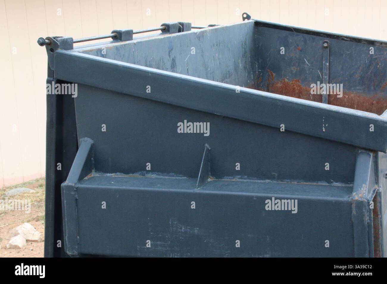 An empty dumpster to fill with trash behind a business Stock Photo - Alamy