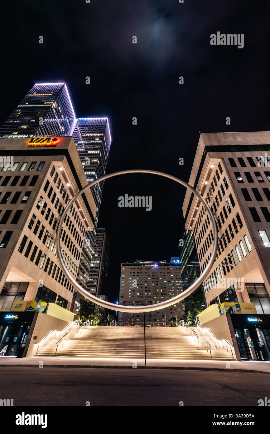 Night view of the Montreal's iconic Anneau artwork, with surrounding ...