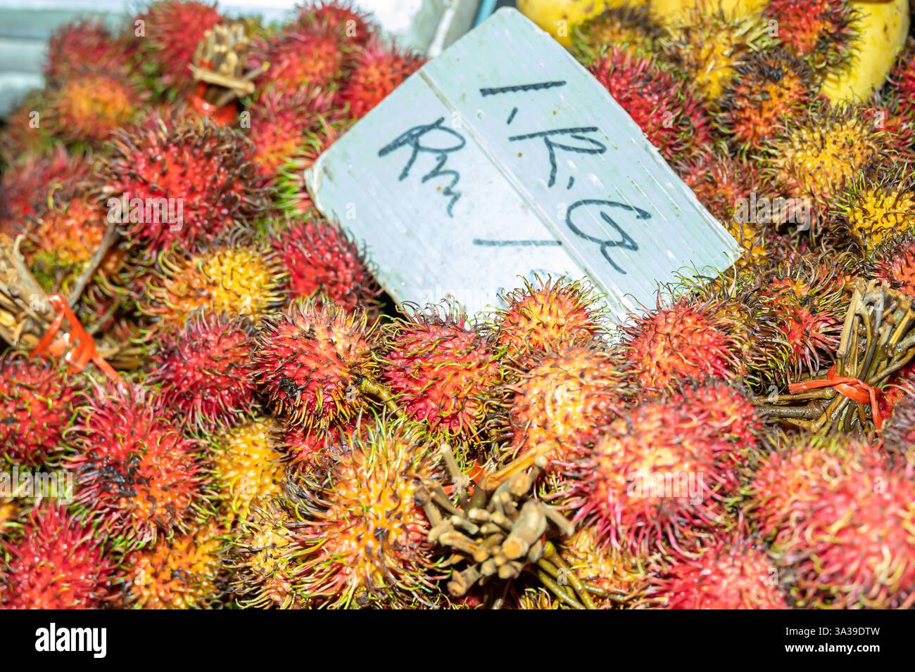 a pile of rambutans, a tropical fruit native to Southeast Asia, Jalan ...