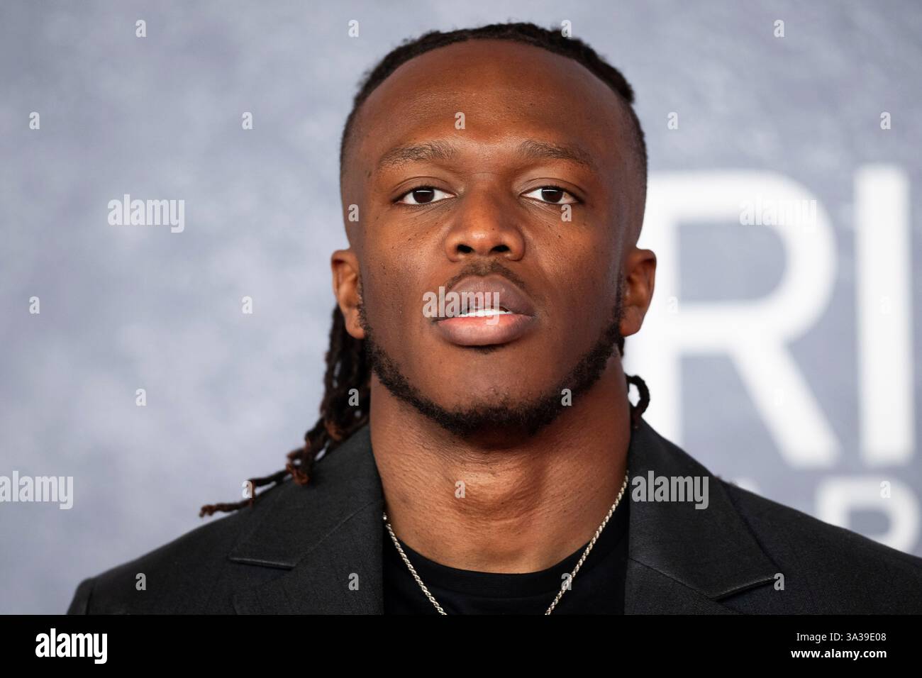 KSI poses for photographers upon arrival at the Brit Awards 2025 in ...