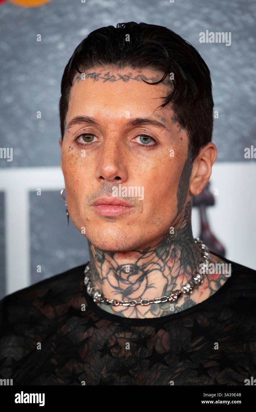 Oliver Sykes of 'Bring Me The Horizon' pose for photographers upon ...