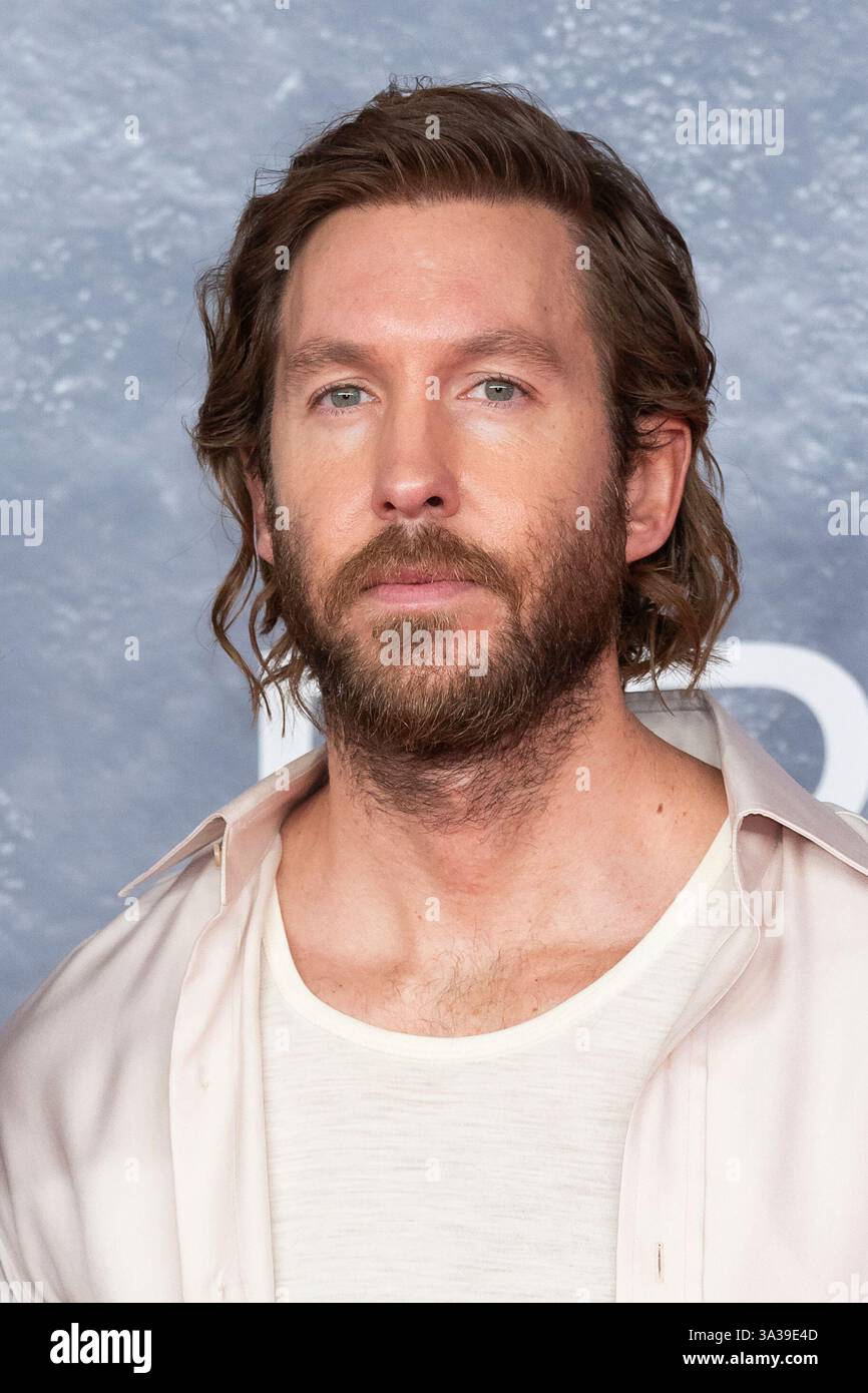 Calvin Harris poses for photographers upon arrival at the Brit Awards ...