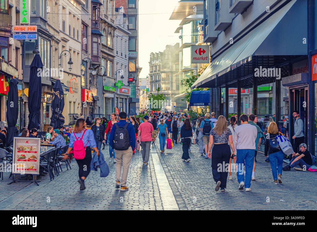 Brussels, Belgium, July 7, 2023: crowd people tourists walking down ...