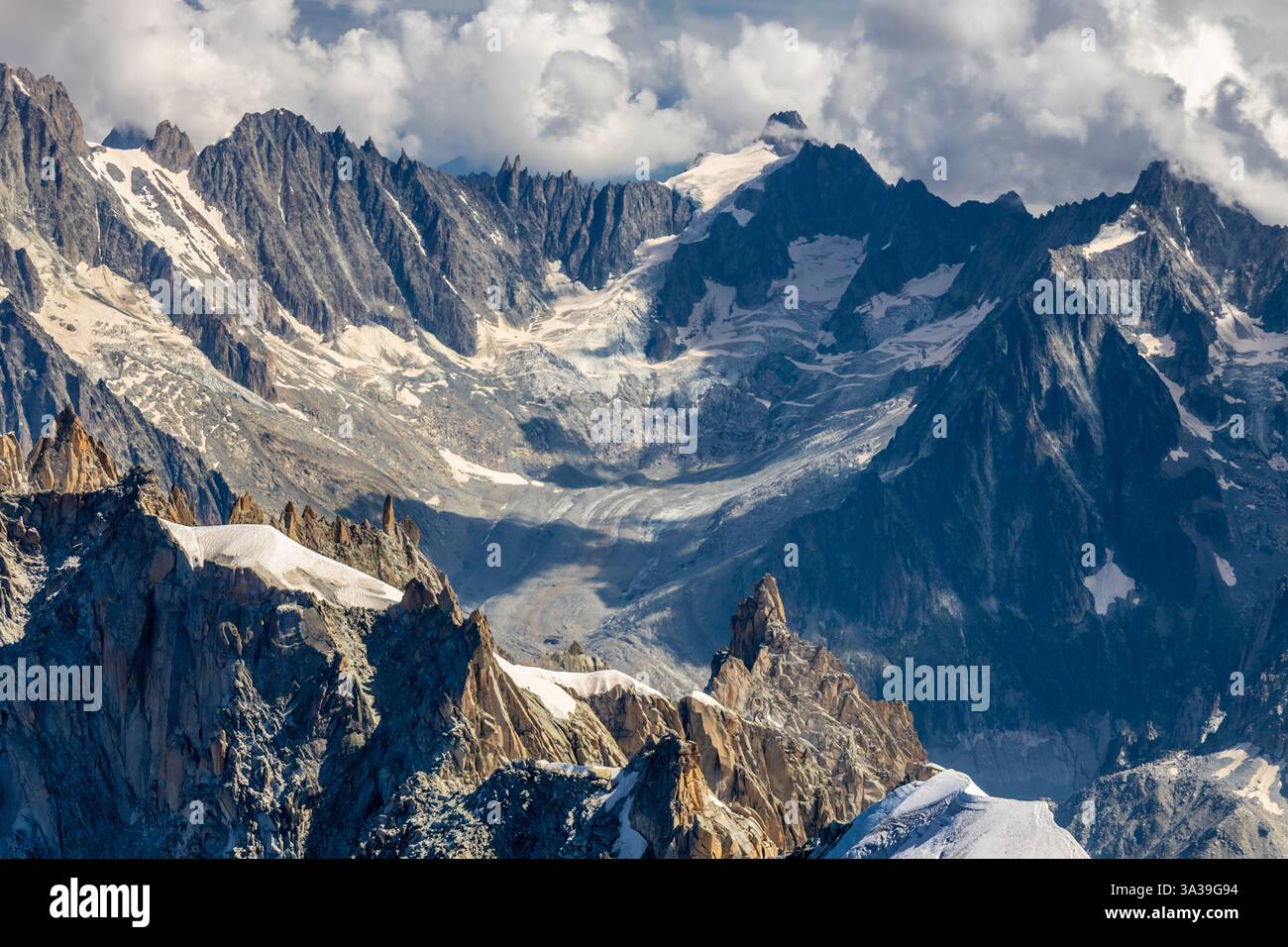 Snow and glacier in the high mountains in the Alps. View of the alpine ...