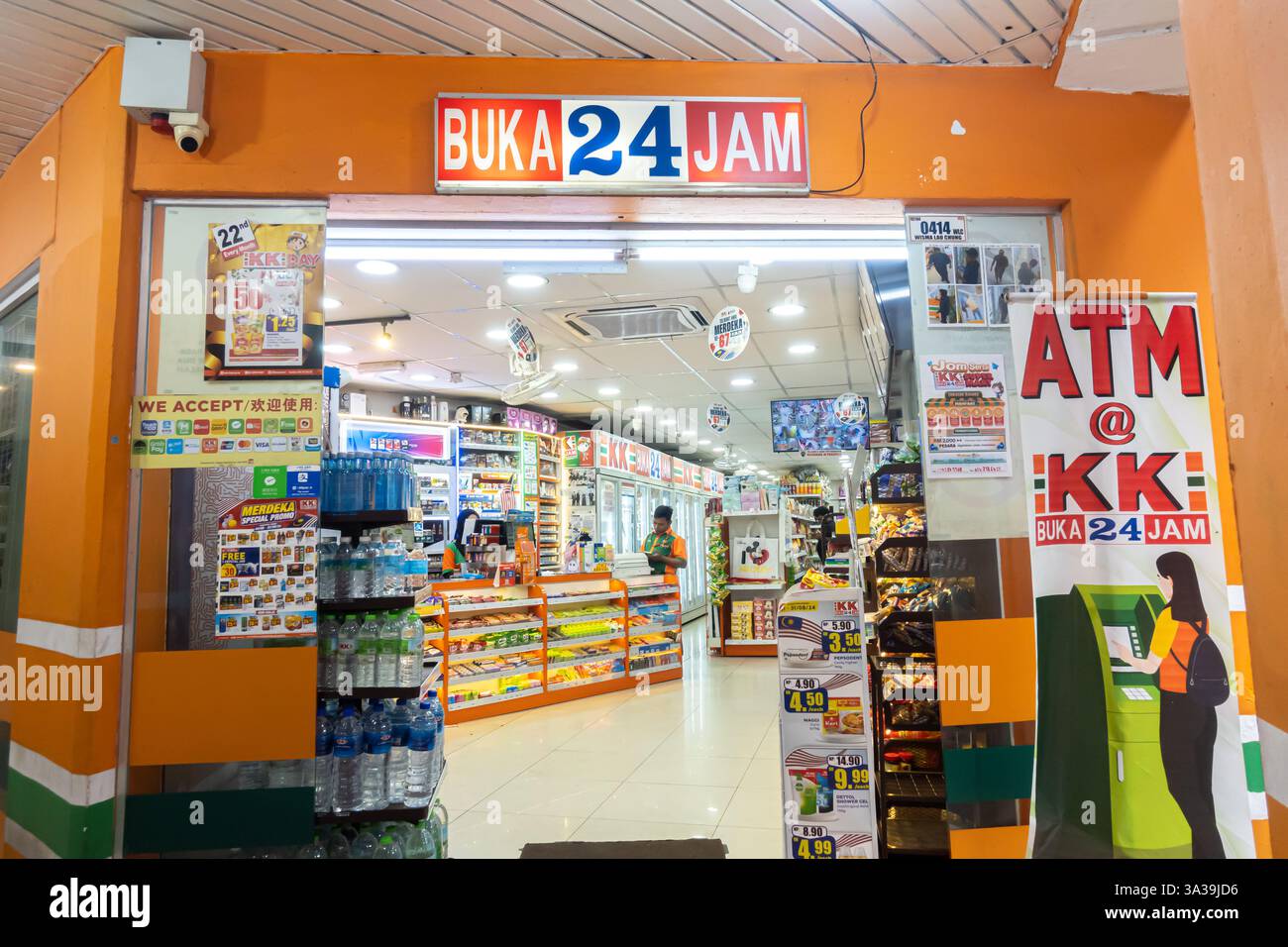 the entrance of a KK Super Mart, a 24-hour convenience store chain ...