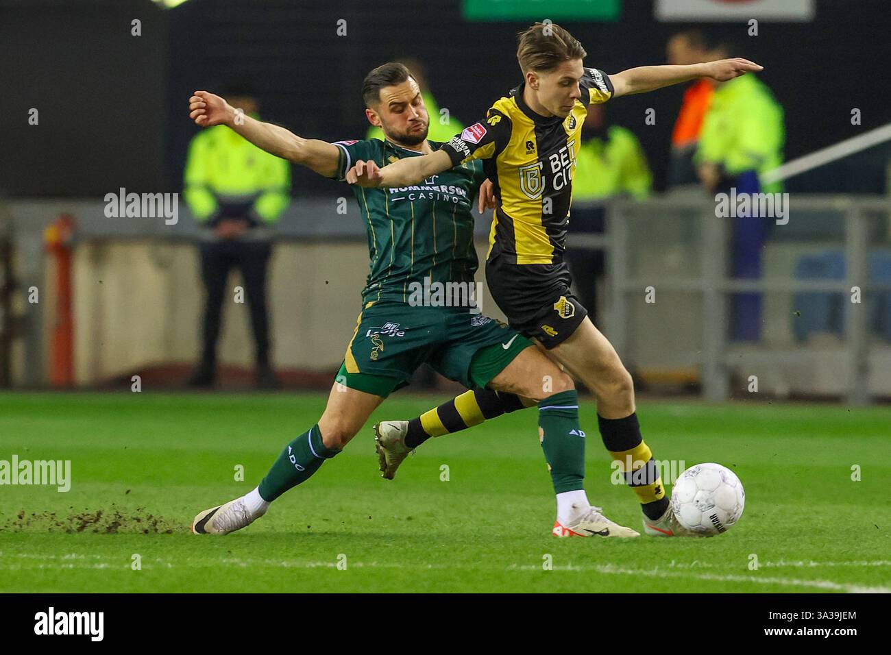 ARNHEM, NETHERLANDS - MARCH 14: Alex Schalk of ADO Den Haag, Jim Koller ...