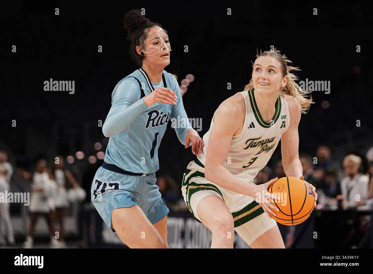 South Florida guard Sammie Puisis (3) prepares to shoot as Rice's Malia ...