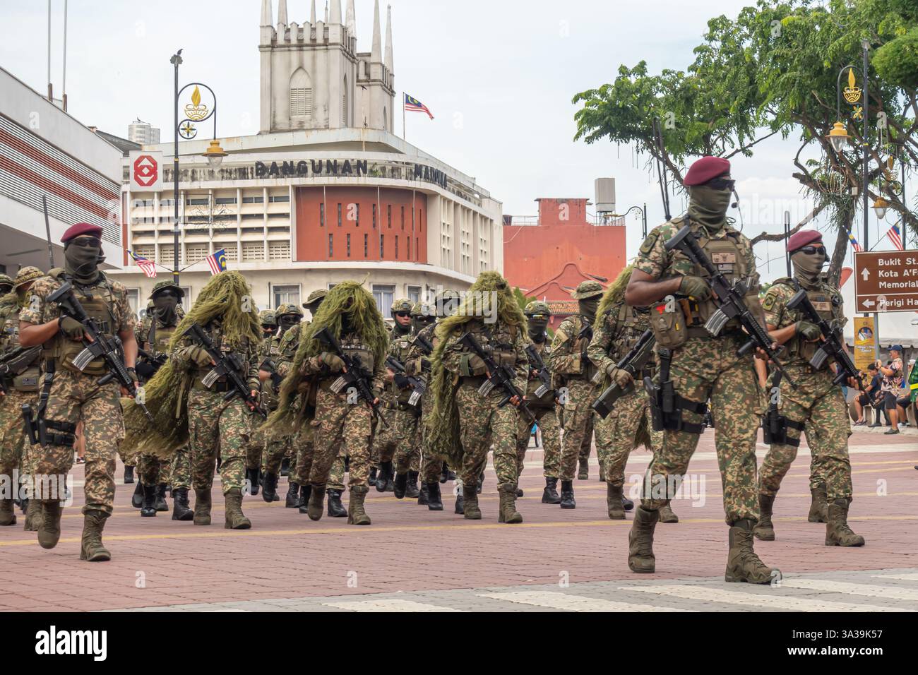 Malaysian armed forces personnel wearing camouflage suits, Ghillie suits,National Day parade in ...