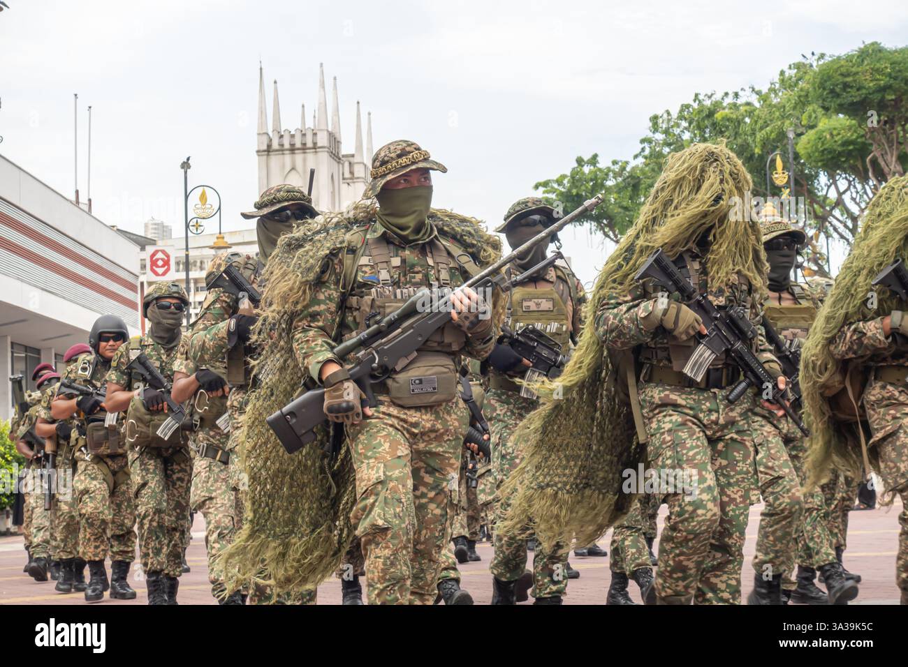 Malaysian armed forces personnel wearing camouflage suits, Ghillie suits,National Day parade in ...