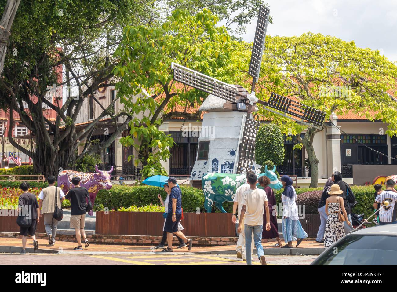 s a replica of a Dutch windmill in Melaka, Malaysia, tourists, people ...