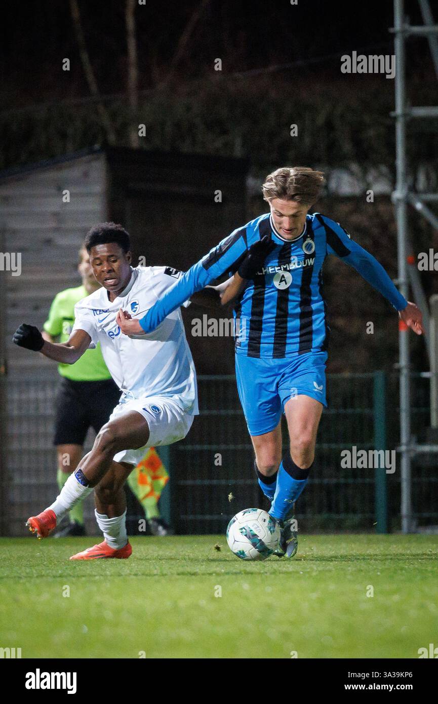 Genk's Pierre Kayden and Club's Romeo Vermant fight for the ball during ...