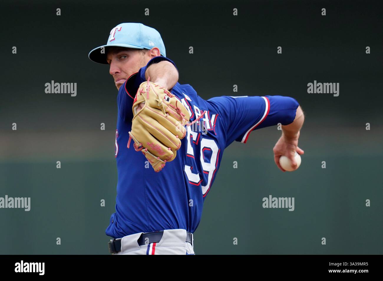 Texas Rangers starting pitcher Patrick Murphy warms up during the first ...