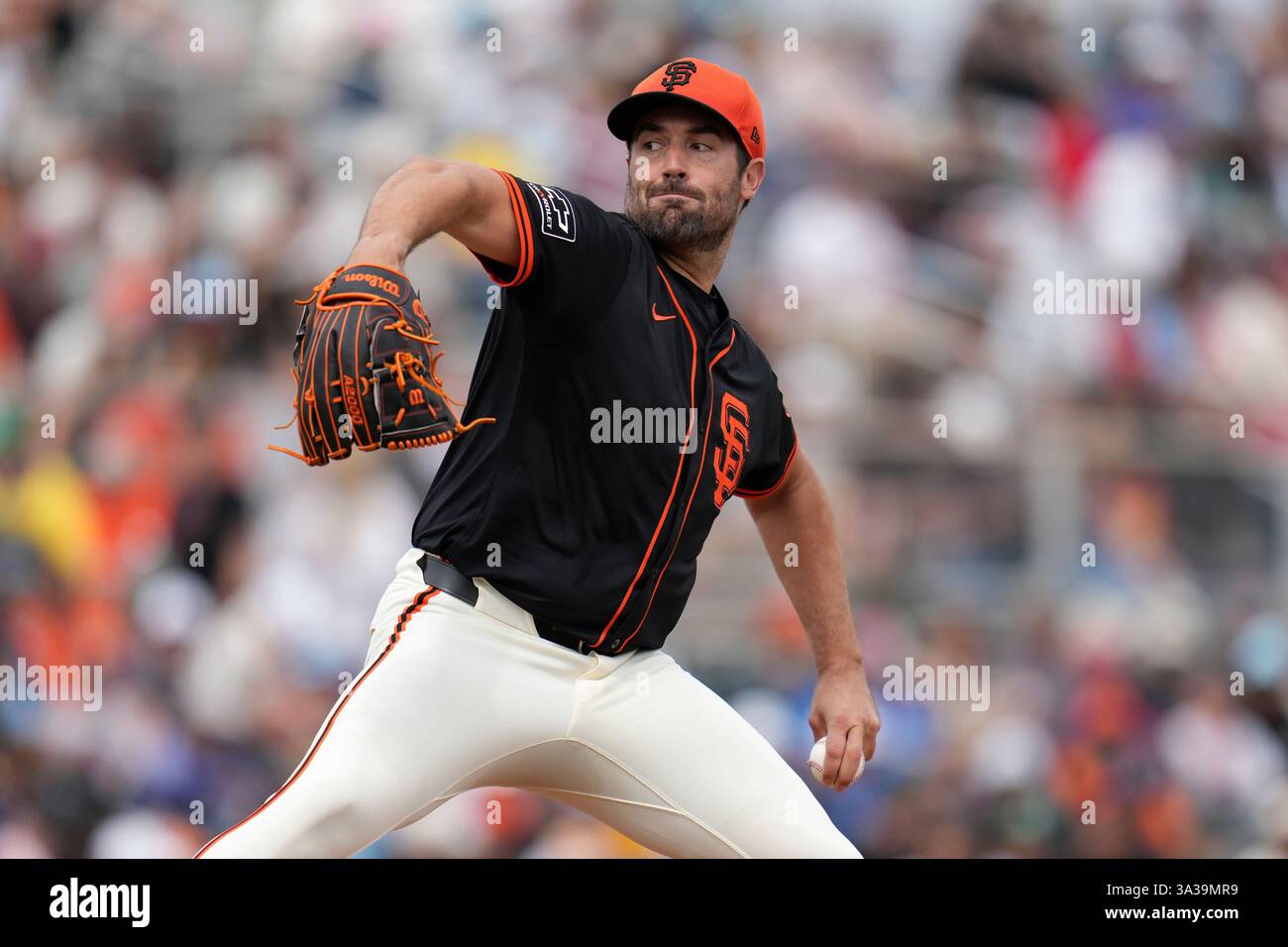 San Francisco Giants starting pitcher Robbie Ray warms up prior to a ...