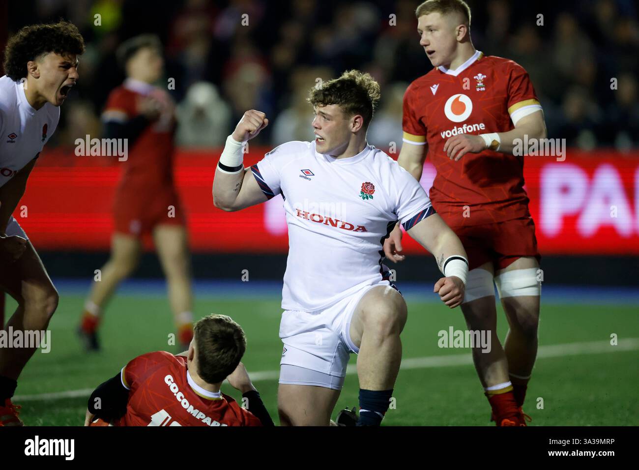 England's Ralph McEachran celebrates after scoring his sides first try ...