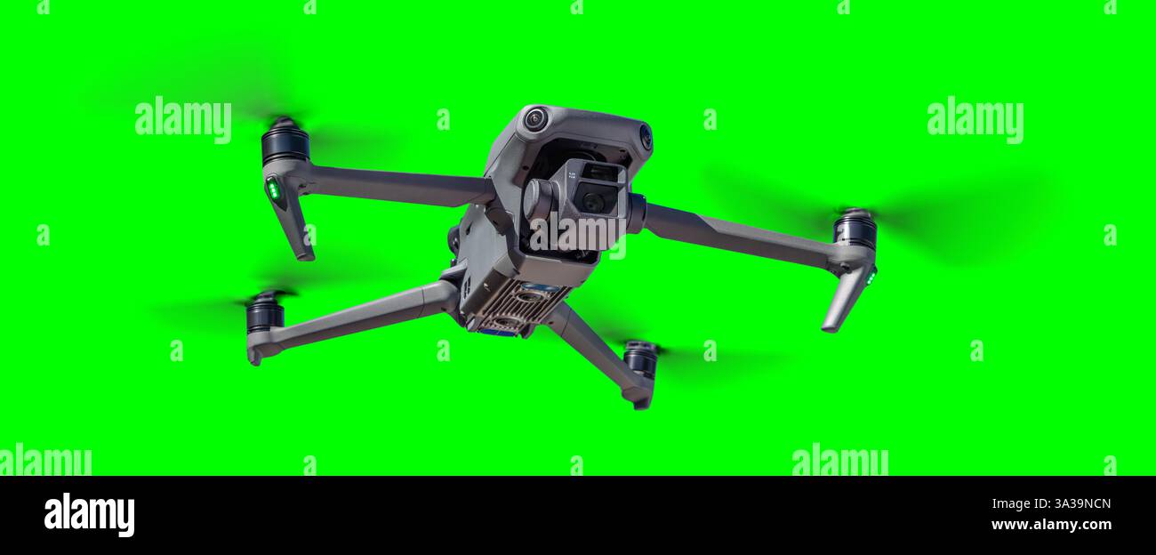 Isolated Unmanned Aircraft System (UAV) Quadcopter Drone In The Air ...