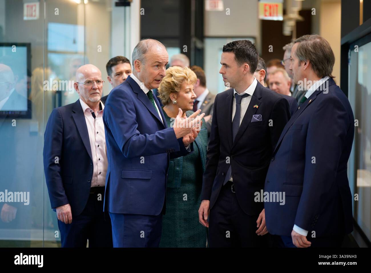 Taoiseach Micheal Martin speaks with Niall Franklin (centre) and Clive ...