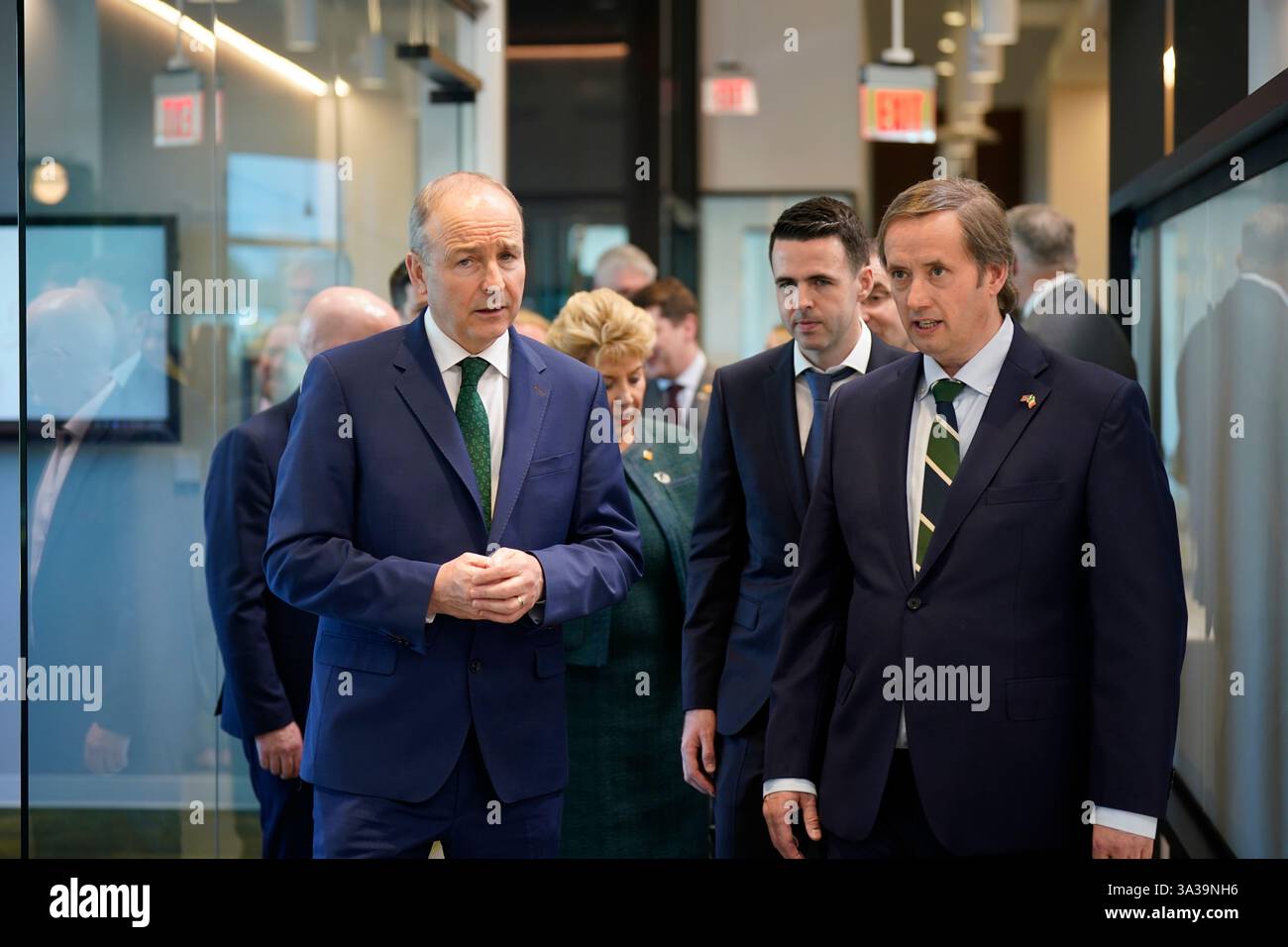 Taoiseach Micheal Martin speaks with Niall Franklin (centre) and Clive ...