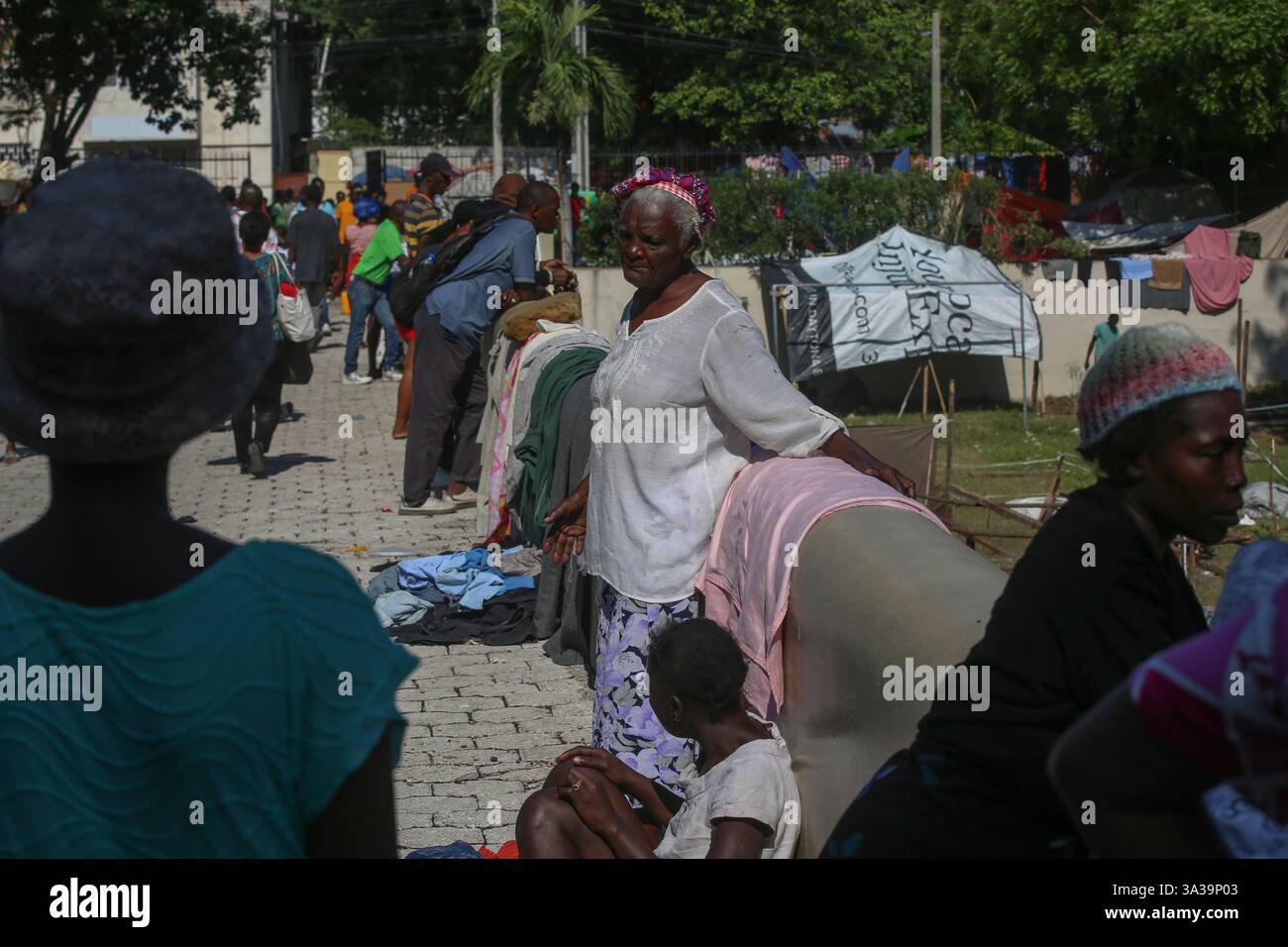 People displaced by gang violence take refuge at a Mormon church ...