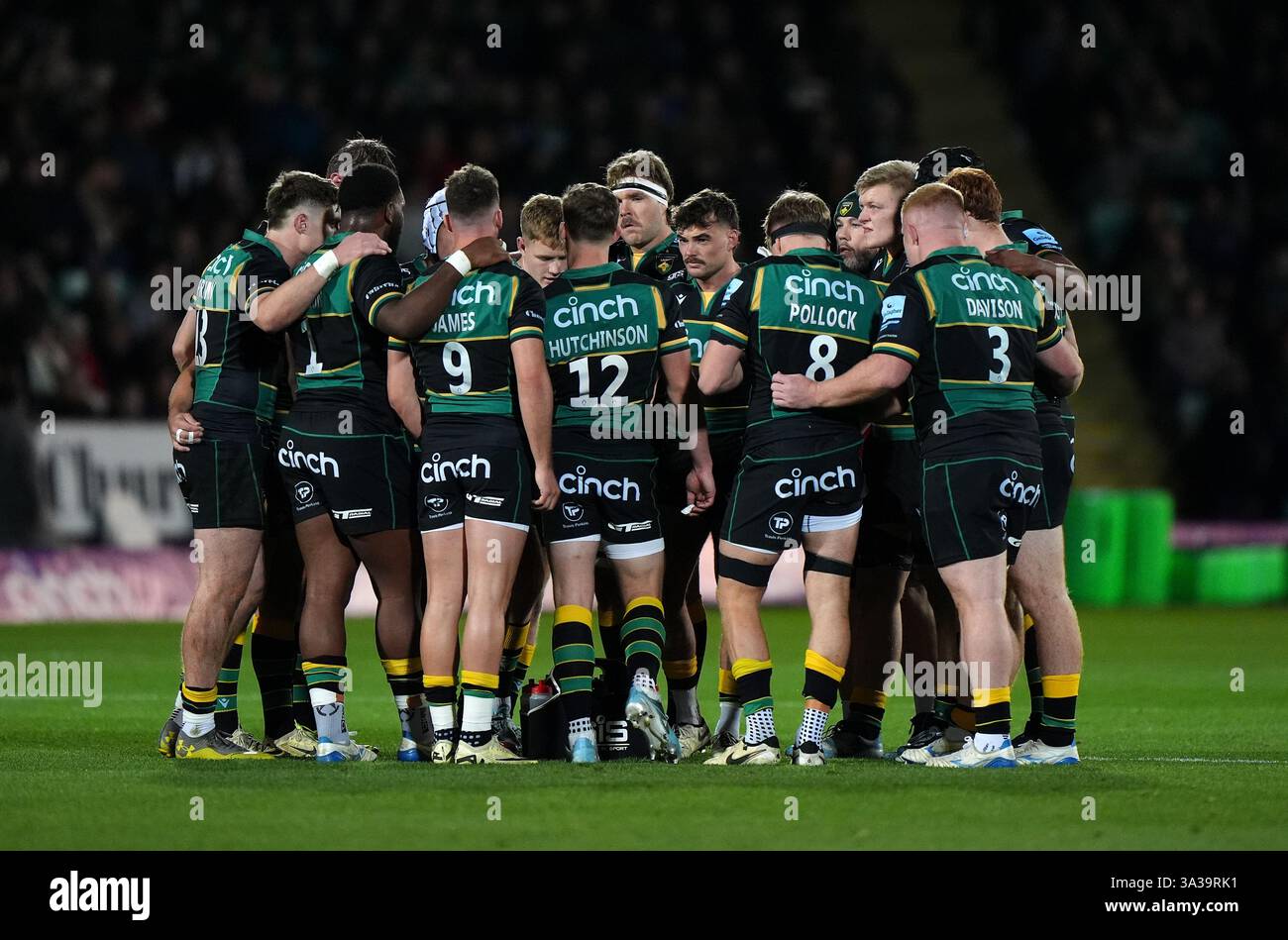 Northampton Saints players have a team huddle during the Gallagher ...