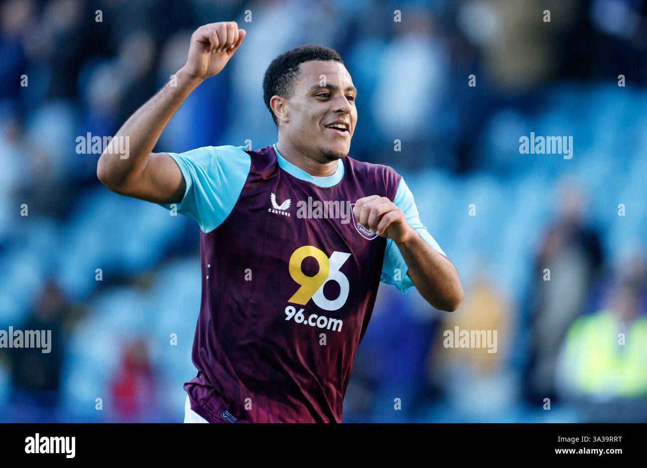 Burnley's CJ Egan-Riley celebrates on the pitch after the Sky Bet ...